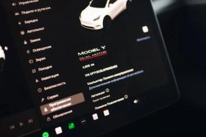 White Tesla Model Y 2022 in Riga, with an engine capacity of 0.00 L and mileage of 30 thousand km for 39000 €, photo 22 on AUTOMOTO.COM.LV
