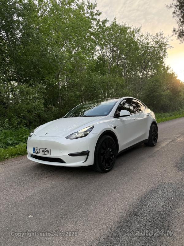 White Tesla Model Y 2022 in Tallinn, with an engine capacity of 0.00 L and mileage of 80 thousand km for 33900 €, photo 3 on AUTOMOTO.COM.LV