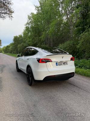 White Tesla Model Y 2022 in Tallinn, with an engine capacity of 0.00 L and mileage of 80 thousand km for 33900 €, photo 5 on AUTOMOTO.COM.LV