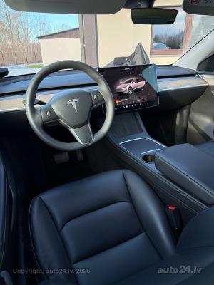 White Tesla Model Y 2022 in Tallinn, with an engine capacity of 0.00 L and mileage of 80 thousand km for 33900 €, photo 9 on AUTOMOTO.COM.LV
