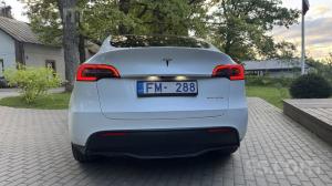 Balts Tesla Model Y 2022 Cēsis, ar dzinēja tilpumu 0.00 L un nobraukumu 124 tūkst. km par 29990 €, foto 5 vietnē AUTOMOTO.COM.LV