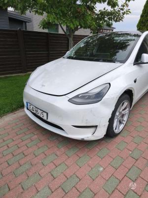 White Tesla Model Y 2022 in Klaipeda, with an engine capacity of 0.00 L and mileage of 51 thousand km for 24500 €, photo  on AUTOMOTO.COM.LV