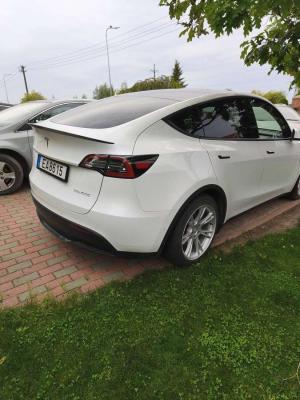 White Tesla Model Y 2022 in Klaipeda, with an engine capacity of 0.00 L and mileage of 51 thousand km for 24500 €, photo 5 on AUTOMOTO.COM.LV