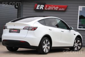 White Tesla Model Y 2022 in Tukums, with an engine capacity of 0.00 L and mileage of 99 thousand km for 32000 €, photo 4 on AUTOMOTO.COM.LV