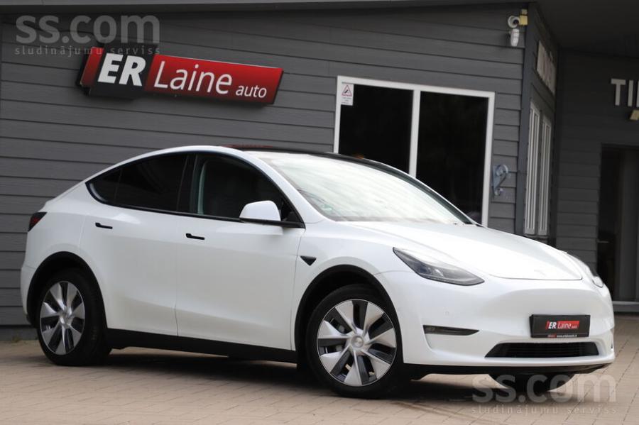 White Tesla Model Y 2022 in Tukums, with an engine capacity of 0.00 L and mileage of 99 thousand km for 32000 €, photo 6 on AUTOMOTO.COM.LV