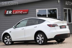 White Tesla Model Y 2022 in Tukums, with an engine capacity of 0.00 L and mileage of 99 thousand km for 32000 €, photo 7 on AUTOMOTO.COM.LV