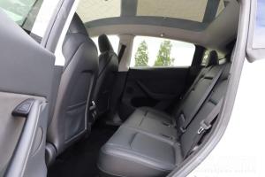 White Tesla Model Y 2022 in Tukums, with an engine capacity of 0.00 L and mileage of 99 thousand km for 32000 €, photo 13 on AUTOMOTO.COM.LV