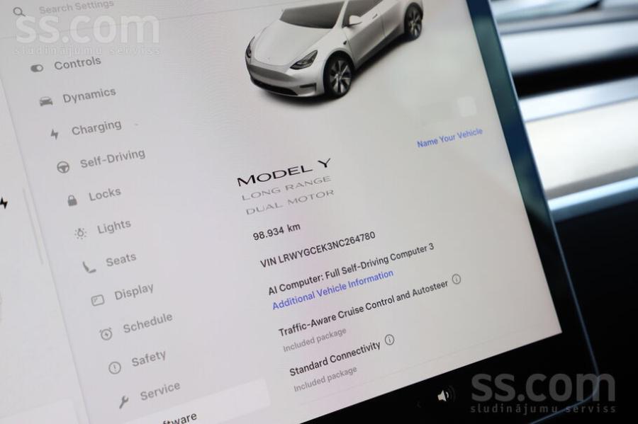 White Tesla Model Y 2022 in Tukums, with an engine capacity of 0.00 L and mileage of 99 thousand km for 32000 €, photo 15 on AUTOMOTO.COM.LV