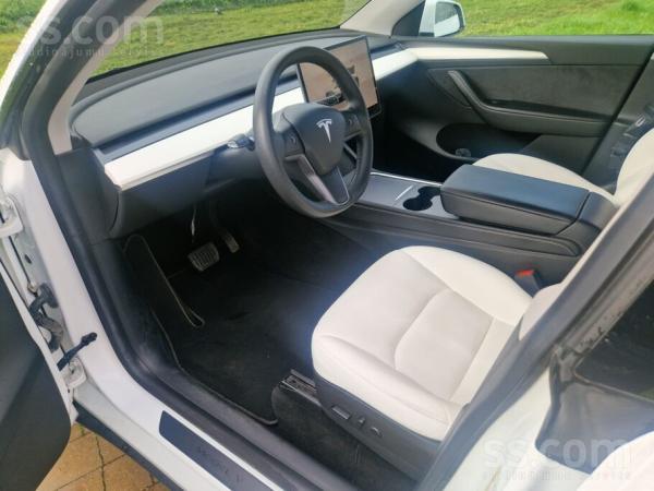 Тесла Модель Y 2022 в Рига на AUTOMOTO.COM.LV Белый Тесла Модель Y 2022 в Рига, объемом двигателя 0.00 л и пробегом 145 тыс. км за 31460 €, фото 11 на AUTOMOTO.COM.LV