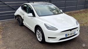 White Tesla Model Y 2023 in Jonava, with an engine capacity of 0.00 L and mileage of 34 thousand km for 15600 €, photo 11 on AUTOMOTO.COM.LV