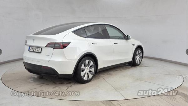 White Tesla Model Y 2023 in Tallinn, with an engine capacity of 0.00 L and mileage of 79 thousand km for 35990 €, photo 2 on AUTOMOTO.COM.LV