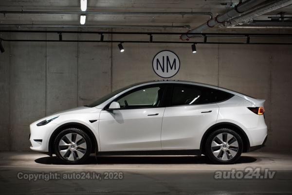 White Tesla Model Y 2023 in Tallinn, with an engine capacity of 0.00 L and mileage of 80 thousand km for 35990 €, photo 7 on AUTOMOTO.COM.LV