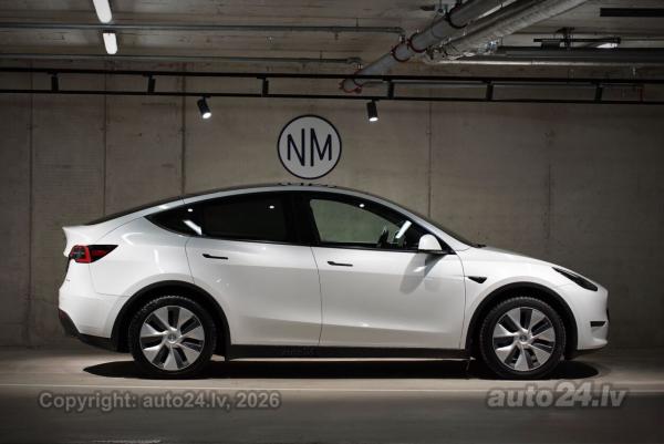 White Tesla Model Y 2023 in Tallinn, with an engine capacity of 0.00 L and mileage of 80 thousand km for 35990 €, photo 8 on AUTOMOTO.COM.LV