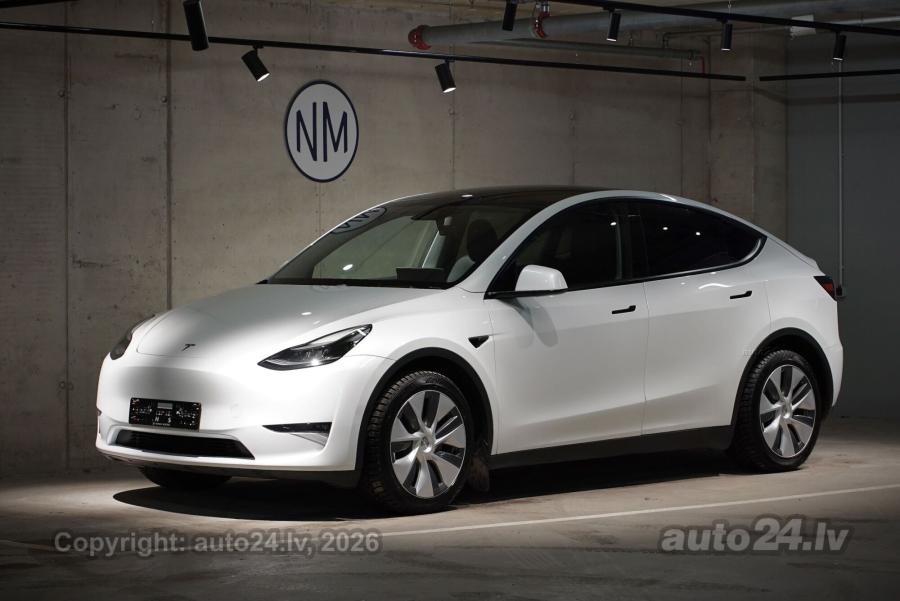 White Tesla Model Y 2023 in Tallinn, with an engine capacity of 0.00 L and mileage of 75 thousand km for 35990 €, photo 1 on AUTOMOTO.COM.LV