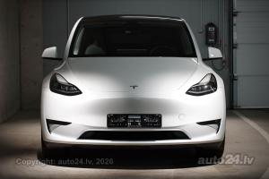 White Tesla Model Y 2023 in Tallinn, with an engine capacity of 0.00 L and mileage of 75 thousand km for 35990 €, photo 6 on AUTOMOTO.COM.LV