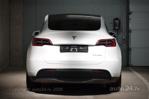 White Tesla Model Y 2023 in Tallinn, with an engine capacity of 0.00 L and mileage of 75 thousand km for 35990 €, photo 7 on AUTOMOTO.COM.LV