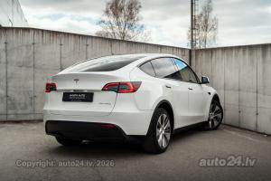 White Tesla Model Y 2023 in Tartu, with an engine capacity of 0.00 L and mileage of 48 thousand km for 36900 €, photo 3 on AUTOMOTO.COM.LV
