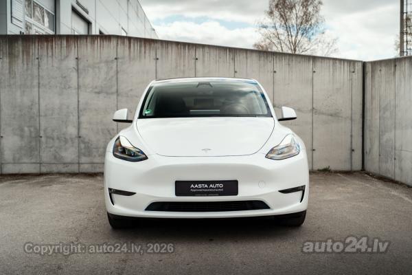 White Tesla Model Y 2023 in Tartu, with an engine capacity of 0.00 L and mileage of 48 thousand km for 36900 €, photo 5 on AUTOMOTO.COM.LV