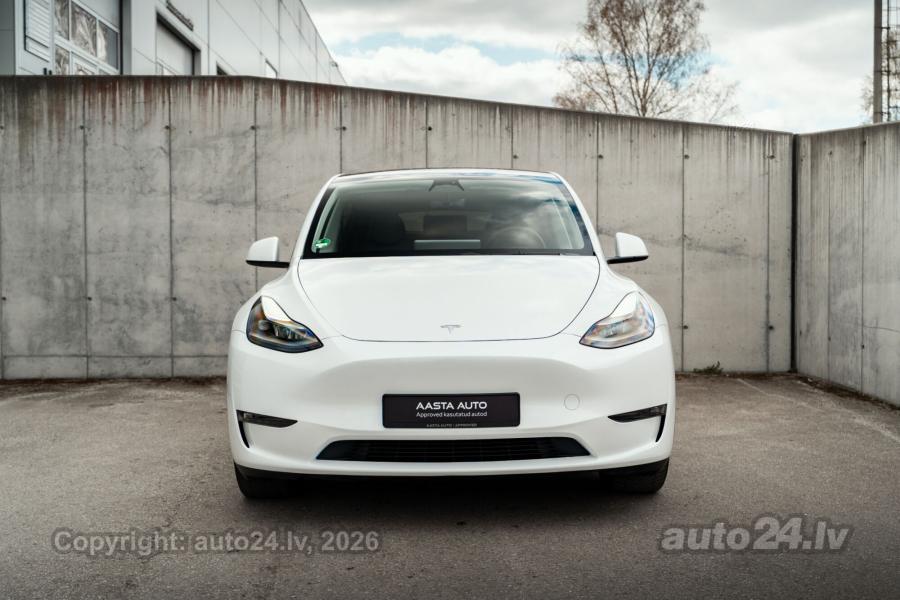 White Tesla Model Y 2023 in Tartu, with an engine capacity of 0.00 L and mileage of 48 thousand km for 36900 €, photo 6 on AUTOMOTO.COM.LV