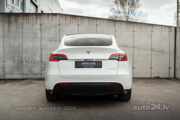 White Tesla Model Y 2023 in Tartu, with an engine capacity of 0.00 L and mileage of 48 thousand km for 36900 €, photo 6 on AUTOMOTO.COM.LV