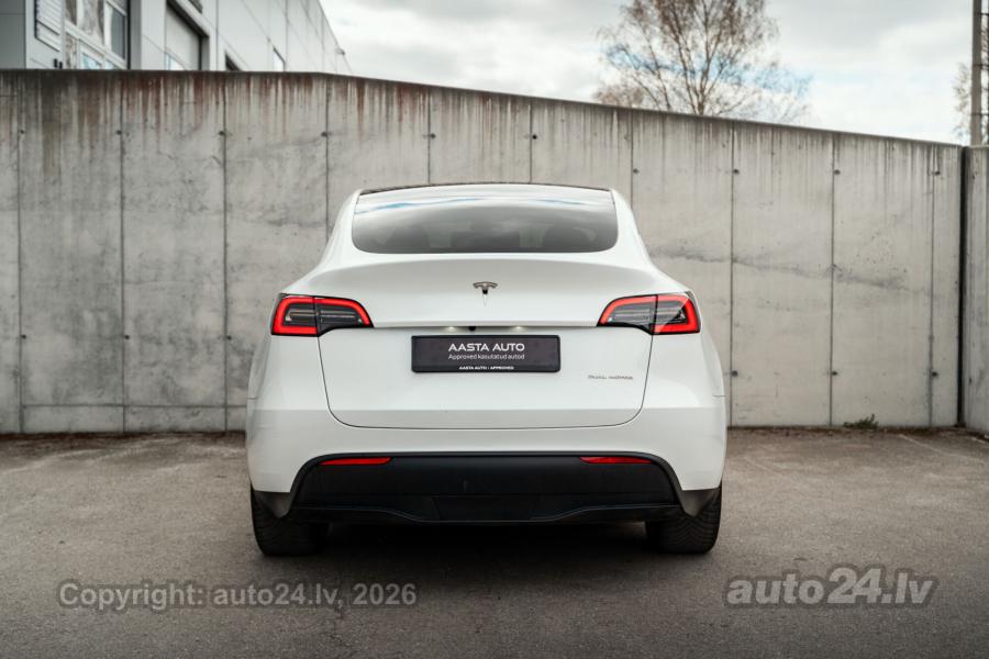 White Tesla Model Y 2023 in Tartu, with an engine capacity of 0.00 L and mileage of 48 thousand km for 36900 €, photo 7 on AUTOMOTO.COM.LV