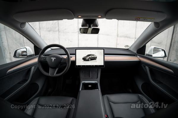 White Tesla Model Y 2023 in Tartu, with an engine capacity of 0.00 L and mileage of 48 thousand km for 36900 €, photo 8 on AUTOMOTO.COM.LV