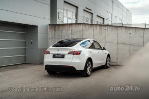 White Tesla Model Y 2023 in Tartu, with an engine capacity of 0.00 L and mileage of 48 thousand km for 36900 €, photo 12 on AUTOMOTO.COM.LV