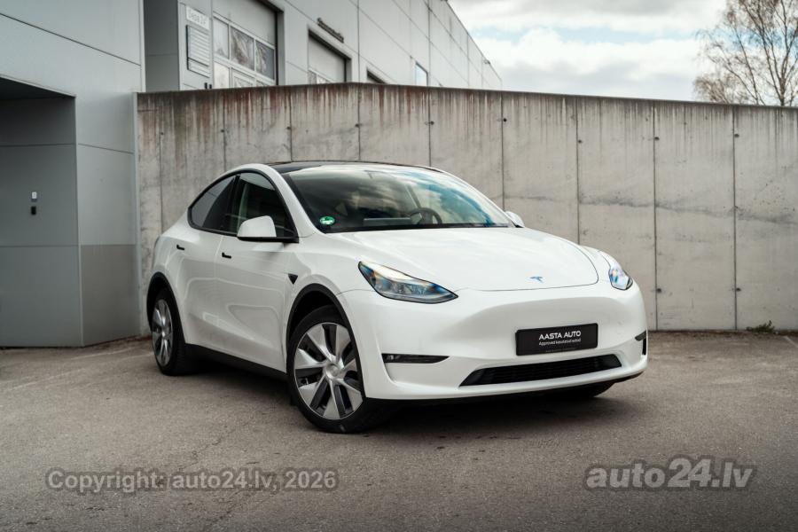 White Tesla Model Y 2023 in Tartu, with an engine capacity of 0.00 L and mileage of 48 thousand km for 36900 €, photo 15 on AUTOMOTO.COM.LV
