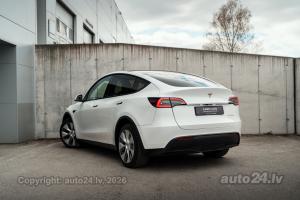 White Tesla Model Y 2023 in Tartu, with an engine capacity of 0.00 L and mileage of 48 thousand km for 36900 €, photo 16 on AUTOMOTO.COM.LV