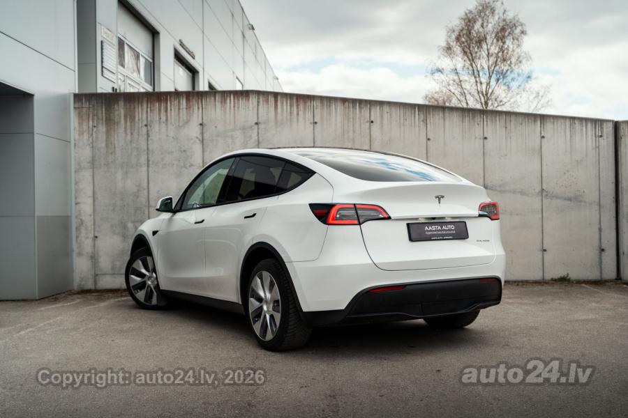 White Tesla Model Y 2023 in Tartu, with an engine capacity of 0.00 L and mileage of 48 thousand km for 36900 €, photo 16 on AUTOMOTO.COM.LV