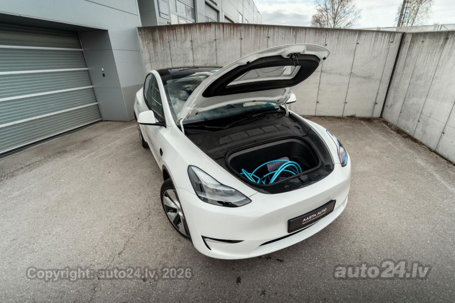 White Tesla Model Y 2023 in Tartu, with an engine capacity of 0.00 L and mileage of 48 thousand km for 36900 €, photo 18 on AUTOMOTO.COM.LV