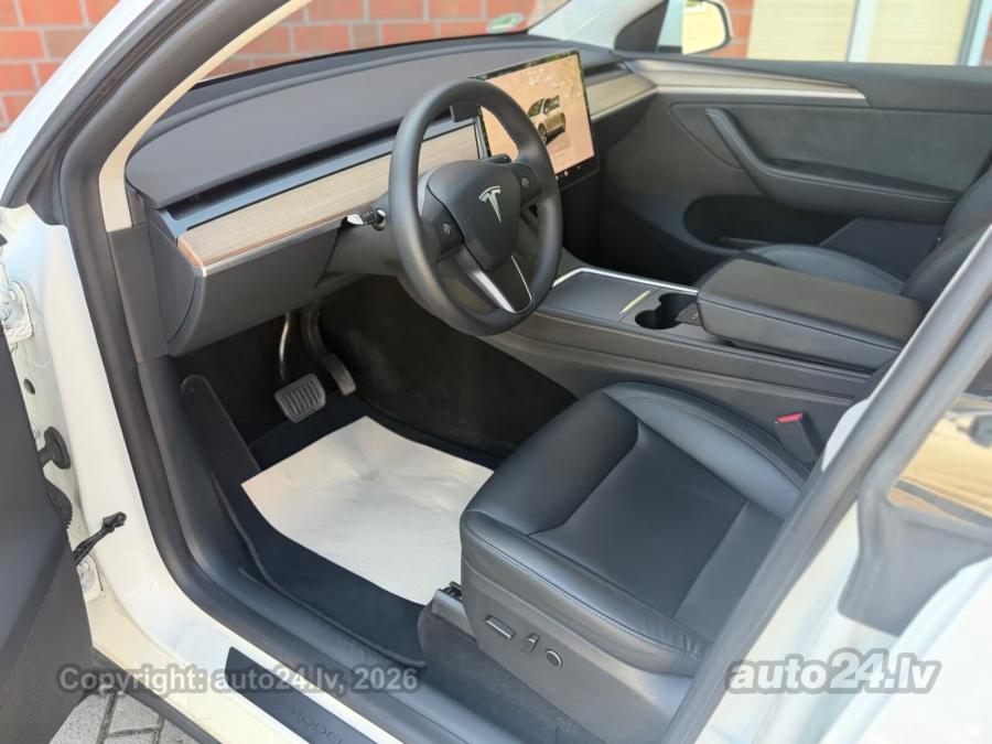 Balts Tesla Model Y 2023 Tallina, ar dzinēja tilpumu 0.00 L un nobraukumu 80 tūkst. km par 36990 €, foto 8 vietnē AUTOMOTO.COM.LV