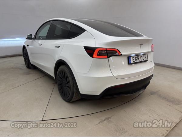 White Tesla Model Y 2023 in Tallinn, with an engine capacity of 0.00 L and mileage of 83 thousand km for 36490 €, photo 4 on AUTOMOTO.COM.LV