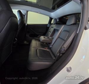 White Tesla Model Y 2023 in Tartu, with an engine capacity of 0.00 L and mileage of 118 thousand km for 33990 €, photo 10 on AUTOMOTO.COM.LV