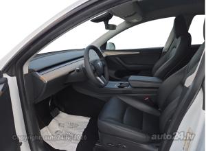 Balts Tesla Model Y 2023 Tallina, ar dzinēja tilpumu 0.00 L un nobraukumu 82 tūkst. km par 37990 €, foto 6 vietnē AUTOMOTO.COM.LV