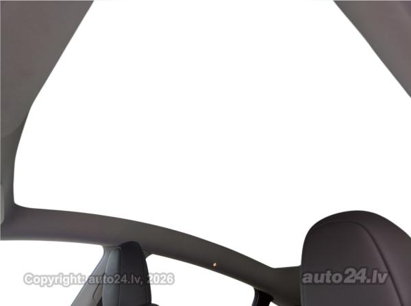 White Tesla Model Y 2023 in Tallinn, with an engine capacity of 0.00 L and mileage of 82 thousand km for 37990 €, photo 6 on AUTOMOTO.COM.LV