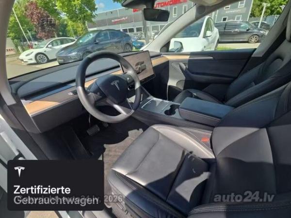 Balts Tesla Model Y 2023 Tallina, ar dzinēja tilpumu 0.00 L un nobraukumu 66 tūkst. km par 37990 €, foto 9 vietnē AUTOMOTO.COM.LV