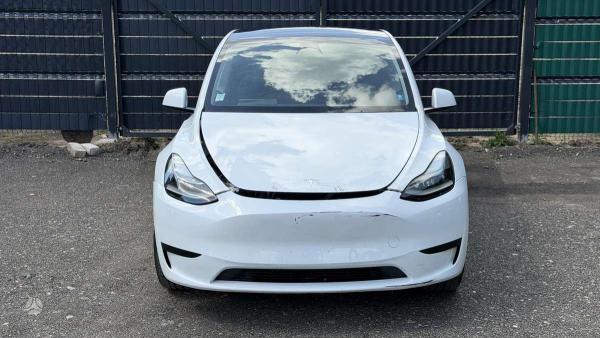 Balts Tesla Model Y 2023 Jonava, ar dzinēja tilpumu 0.00 L un nobraukumu 70 tūkst. km par 15950 €, foto 2 vietnē AUTOMOTO.COM.LV