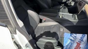 White Tesla Model Y 2023 in Jonava, with an engine capacity of 0.00 L and mileage of 70 thousand km for 15950 €, photo 20 on AUTOMOTO.COM.LV