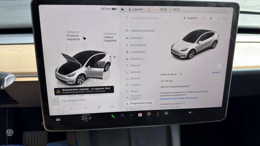 White Tesla Model Y 2023 in Jonava, with an engine capacity of 0.00 L and mileage of 70 thousand km for 15950 €, photo 23 on AUTOMOTO.COM.LV