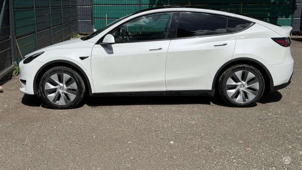 Balts Tesla Model Y 2023 Jonava, ar dzinēja tilpumu 0.00 L un nobraukumu 70 tūkst. km par 15950 €, foto 4 vietnē AUTOMOTO.COM.LV