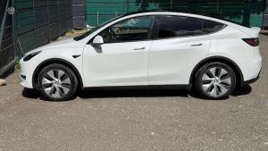 Белый Тесла Модель Y 2023 в Ионава, объемом двигателя 0.00 л и пробегом 70 тыс. км за 15950 €, фото 13 на AUTOMOTO.COM.LV
