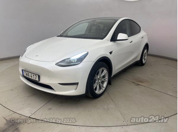 White Tesla Model Y 2023 in Tallinn, with an engine capacity of 0.00 L and mileage of 49 thousand km for 38990 €, photo 1 on AUTOMOTO.COM.LV