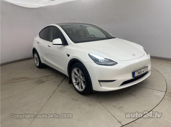 White Tesla Model Y 2023 in Tallinn, with an engine capacity of 0.00 L and mileage of 49 thousand km for 38990 €, photo 2 on AUTOMOTO.COM.LV