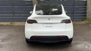 Balts Tesla Model Y 2023 Jonava, ar dzinēja tilpumu 0.00 L un nobraukumu 70 tūkst. km par 16500 €, foto  vietnē AUTOMOTO.COM.LV