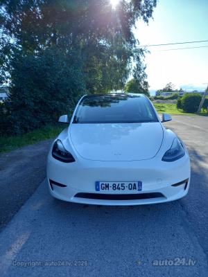 White Tesla Model Y 2023 in Tartu, with an engine capacity of 0.00 L and mileage of 29 thousand km for 35200 €, photo 8 on AUTOMOTO.COM.LV