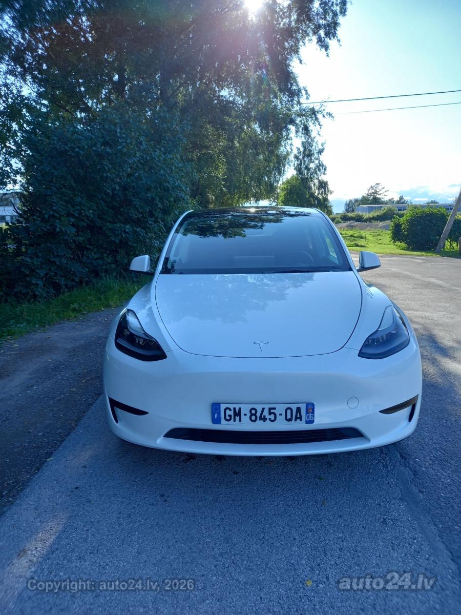 White Tesla Model Y 2023 in Tartu, with an engine capacity of 0.00 L and mileage of 29 thousand km for 35200 €, photo 8 on AUTOMOTO.COM.LV