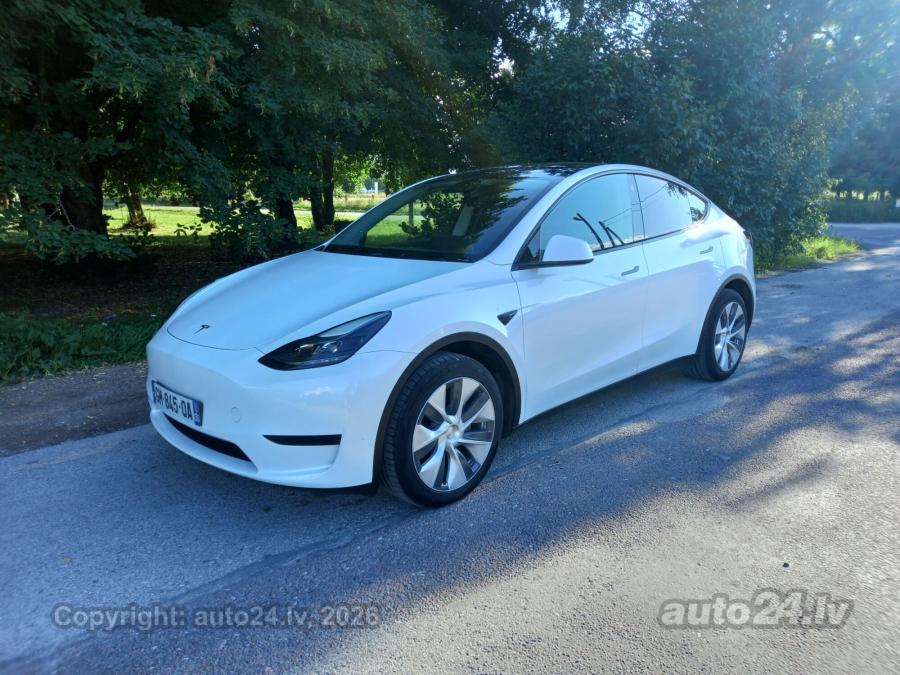 White Tesla Model Y 2023 in Tartu, with an engine capacity of 0.00 L and mileage of 29 thousand km for 35200 €, photo 9 on AUTOMOTO.COM.LV