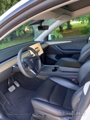 White Tesla Model Y 2023 in Tartu, with an engine capacity of 0.00 L and mileage of 29 thousand km for 35200 €, photo 10 on AUTOMOTO.COM.LV