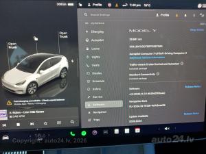 White Tesla Model Y 2023 in Tartu, with an engine capacity of 0.00 L and mileage of 29 thousand km for 35200 €, photo 11 on AUTOMOTO.COM.LV
